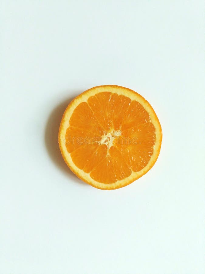 Slice of Orange in the Center of White Background Stock Image - Image ...