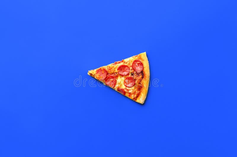 Slice of Pepperoni Pizza Isolated on a Blue Background Stock Photo ...
