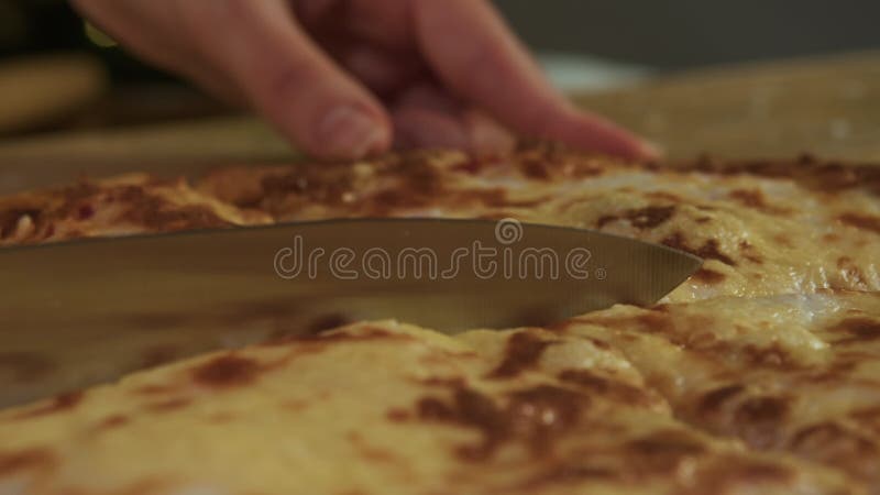 Slice of Pizza or Quiche with a Baked and Crispy Cheese Crust is Cut ...