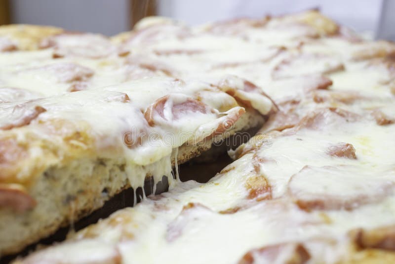 Slice of Pizza with a Strech of Melted Cheese Stock Image - Image of ...