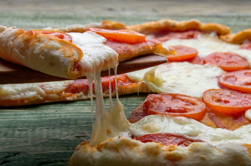 Slice Pizza on Wood Fork. Close-up Stock Image - Image of delicious ...