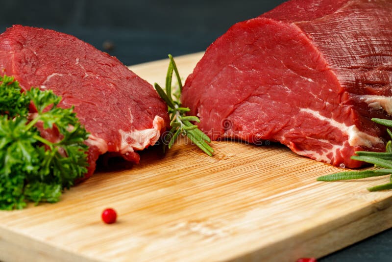 Raw Beef Fillet Piece on Wooden Board Close Up Stock Photo - Image of ...