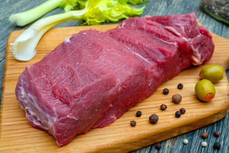 Slice of Raw Fresh Lean Beef on a Meat Cutting Board Stock Image ...