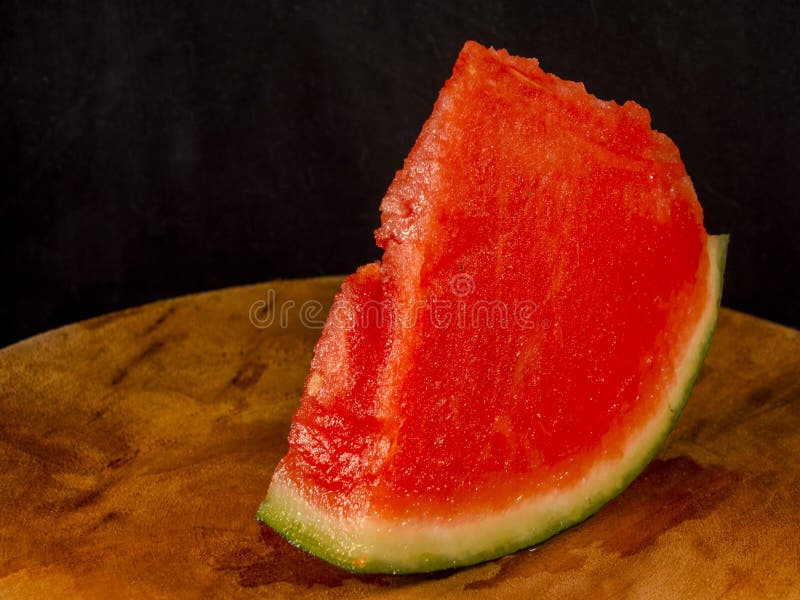 Slice of Red Water Melon on a Wooden Plate Stock Image - Image of ...