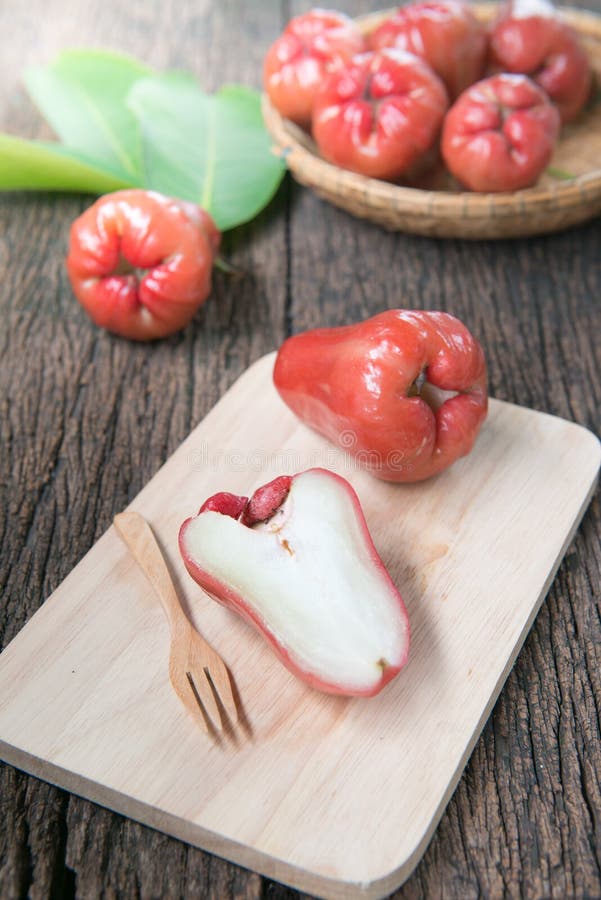 Slice Rose Apple on Wood Plate Stock Image - Image of food, delicious ...