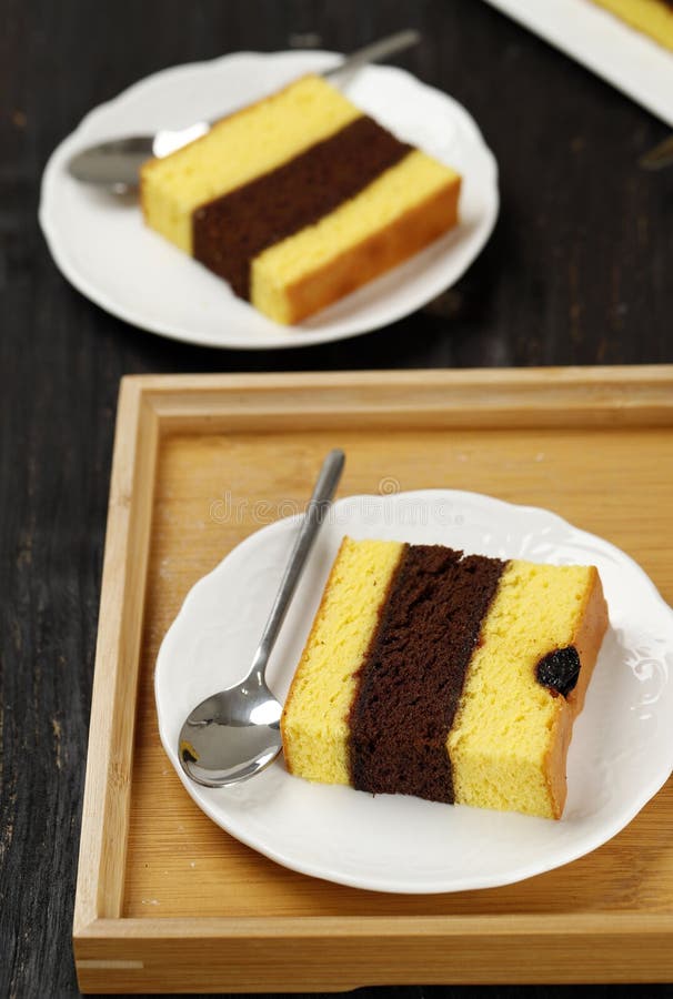 Slice Spiku Lapis Surabaya on White Plate Stock Photo - Image of baked ...