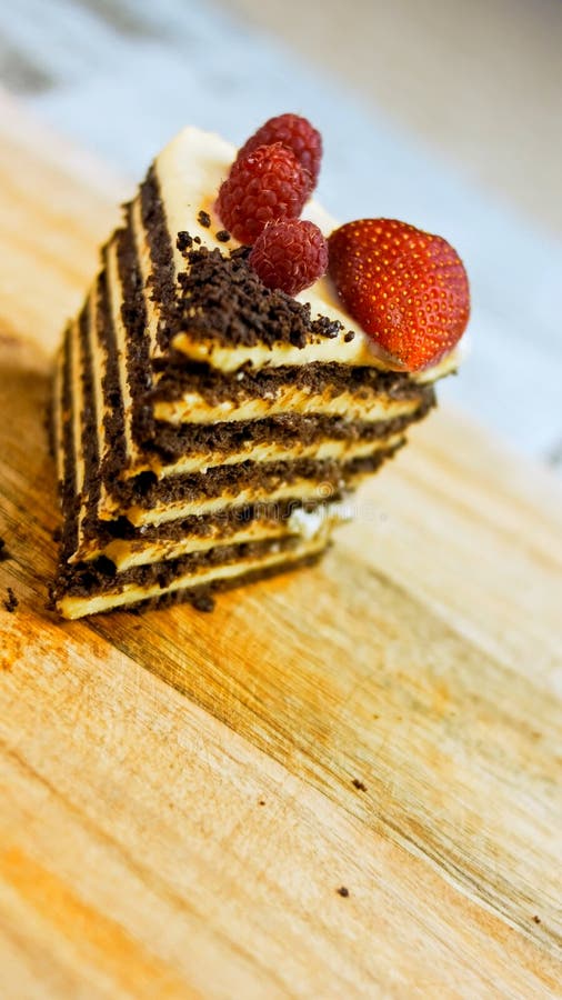 A Slice of Strawberry and Raspberry Cake and Slices Pressed with ...