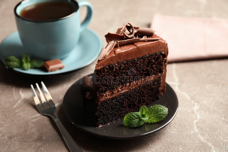 Slice of Tasty Chocolate Cake and Cup of Tea Served Stock Photo - Image ...