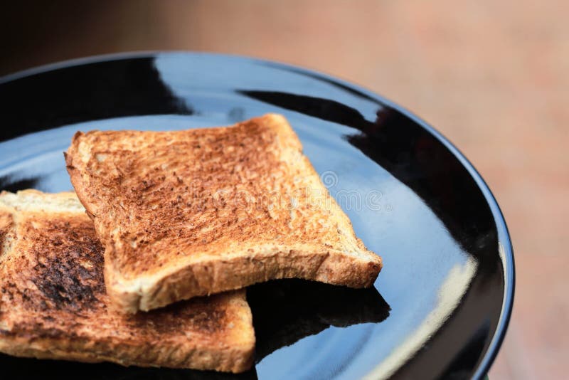 Slice Toasted Bread on Black Dish. Stock Image - Image of gourmet ...