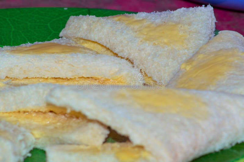 Slice of White Bread Spread with Butter and Granulated Sugar on Plate ...
