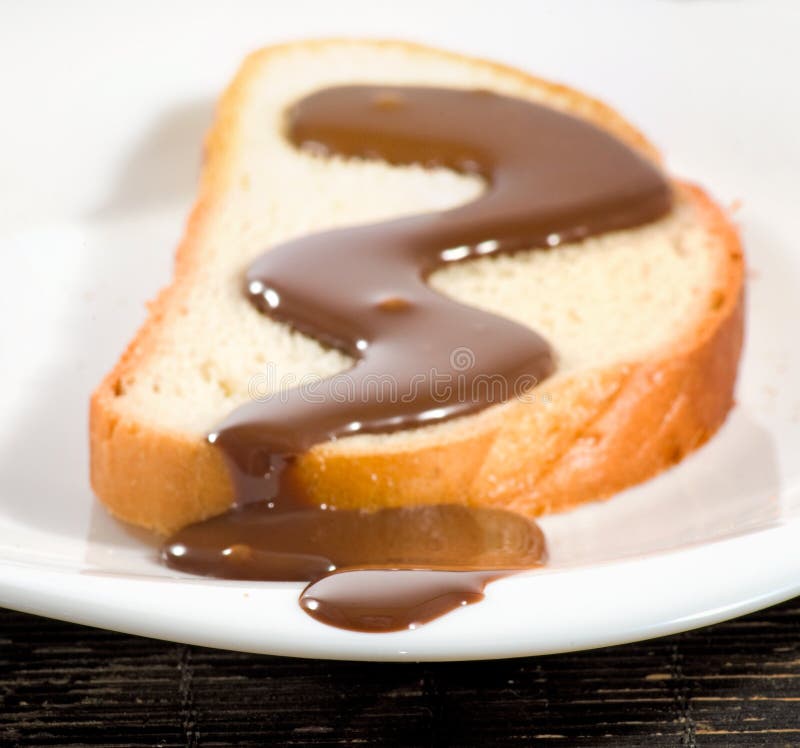Slice of White Bread Watered with Liquid Chocolate Close-up Stock Photo ...
