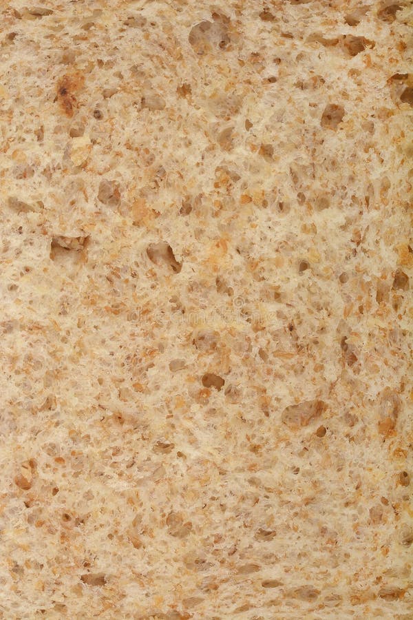 Slice of whole wheat bread stock photo. Image of baked - 387334580