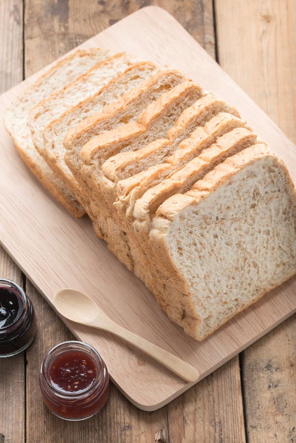 Slice of a Whole Wheat Bread with Samll Jam Jar. Stock Photo - Image of ...