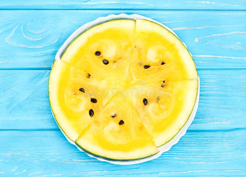 Slice yellow watermelon stock image. Image of snack, peel - 76010043