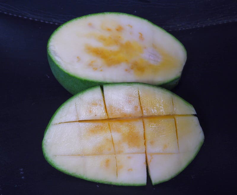 Slice of Young Mango with Green Skin Stock Photo - Image of dish ...