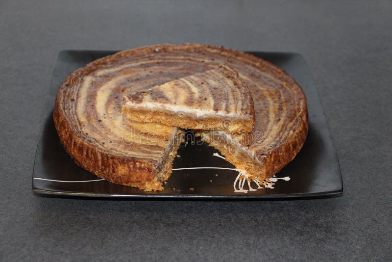 Slice of Zebra Cheese Cake on the Full Cake Stock Photo - Image of ...
