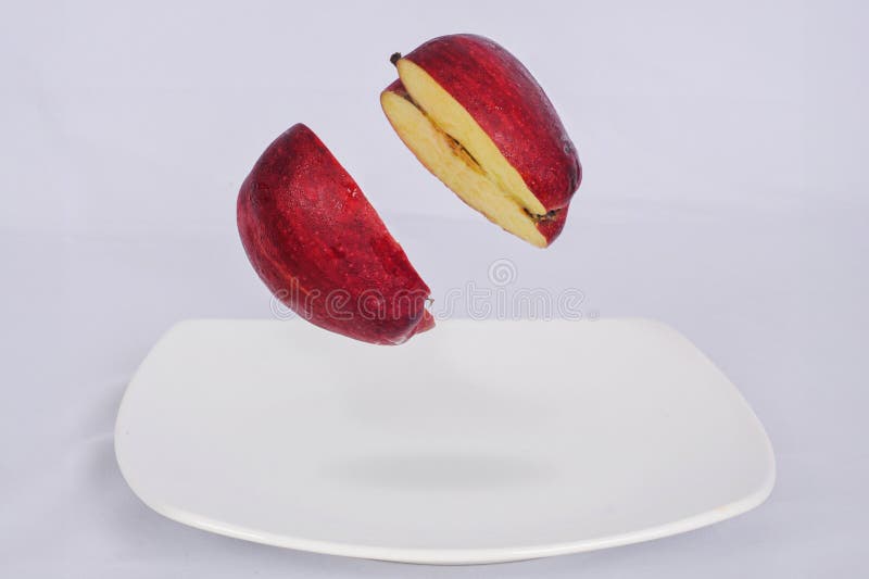 Sliced Apple in the Air stock photo. Image of sweetness - 292093518