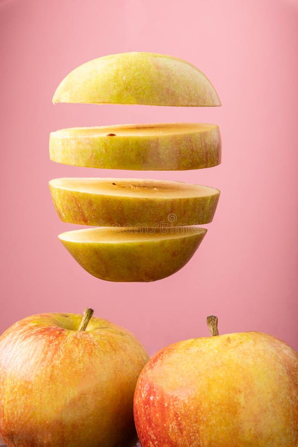 Sliced apple falling stock photo. Image of granny, health - 295577432