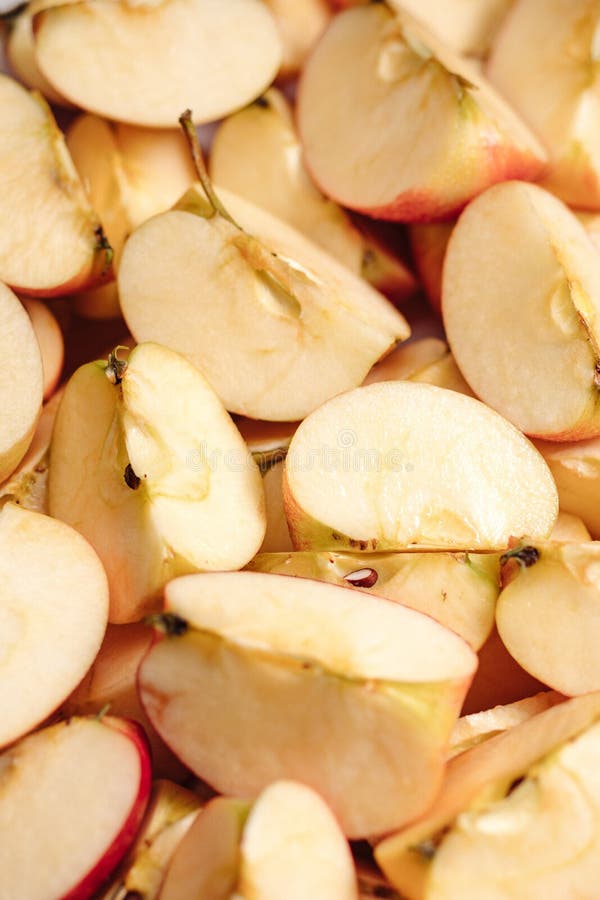Sliced Apples Fruit. Vertical Close-up View of Many Slices of Cut ...