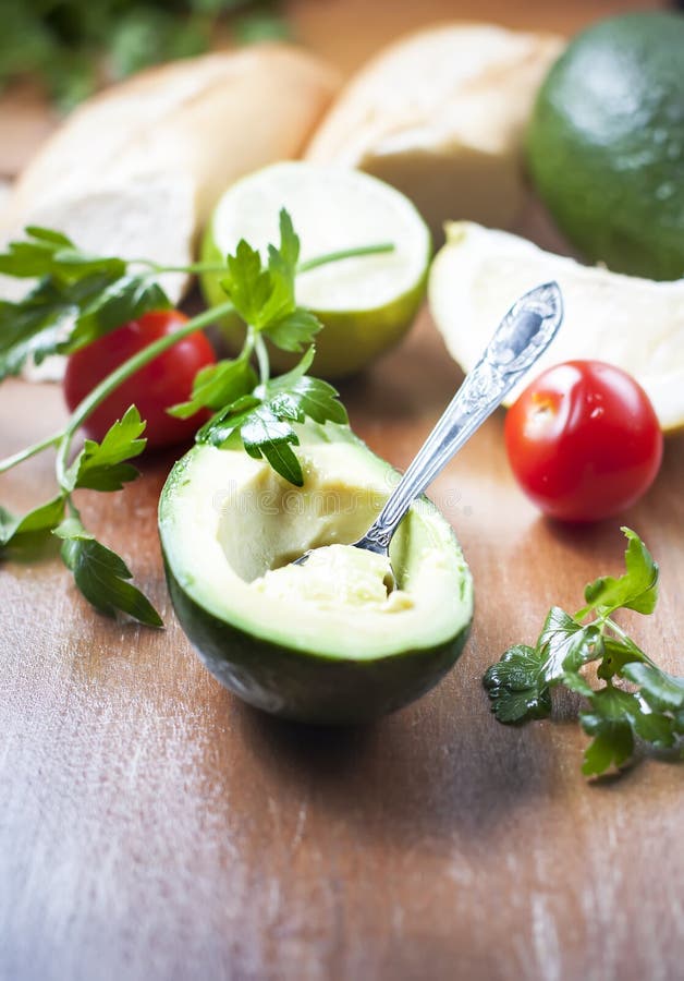 Sliced Avocado, Complete with Spoon Ready To Eat Stock Image - Image of ...