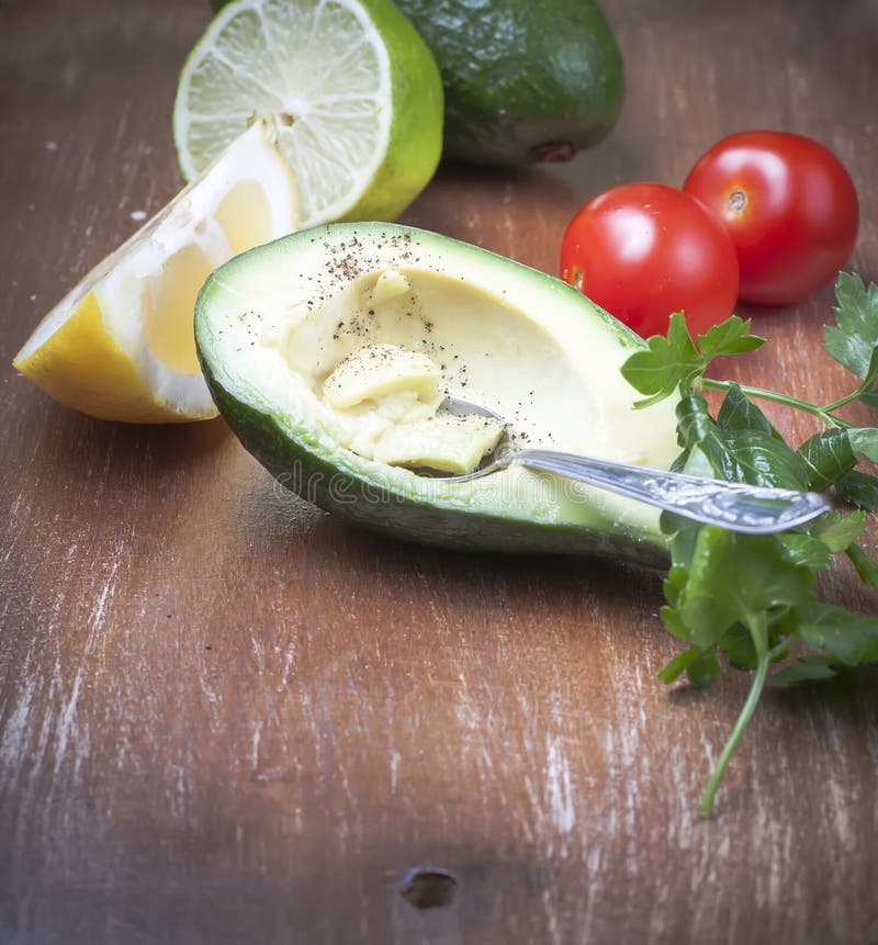 Sliced Avocado, Complete with Spoon Ready To Eat Stock Image - Image of ...