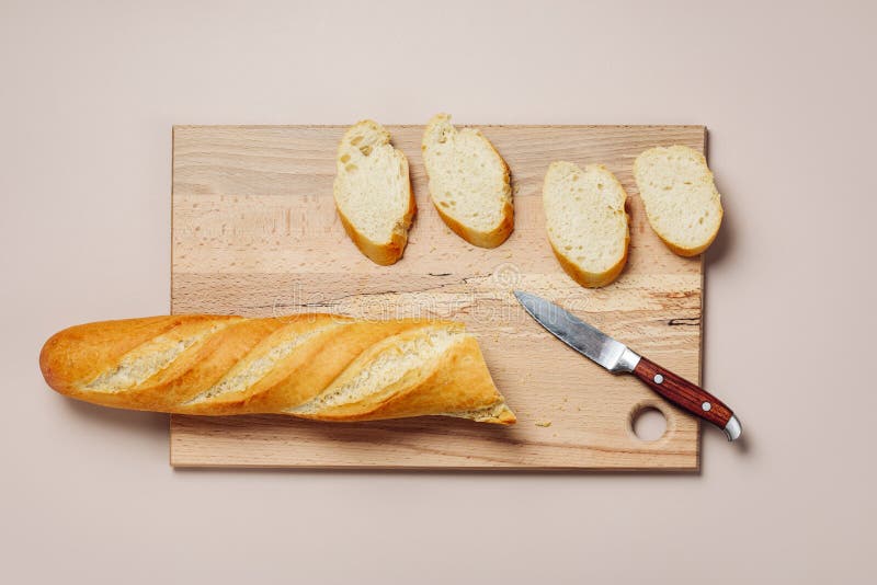 Sliced Baguette on a Cutting Board Stock Image - Image of white ...