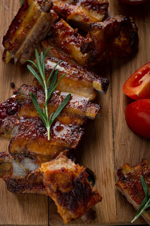 Sliced Bbq Ribs on Cutting Board Stock Image - Image of barbecued ...