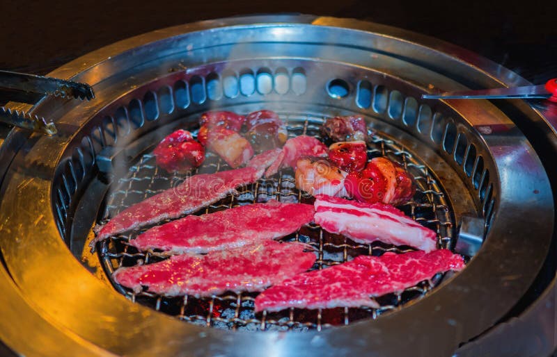 Sliced Beef on Hot Charcoal Grill, Restaurant. Stock Photo - Image of ...