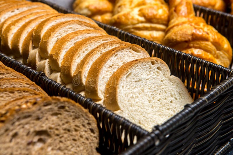 Sliced Bread and Croissants in a Basket Stock Photo - Image of bakery ...