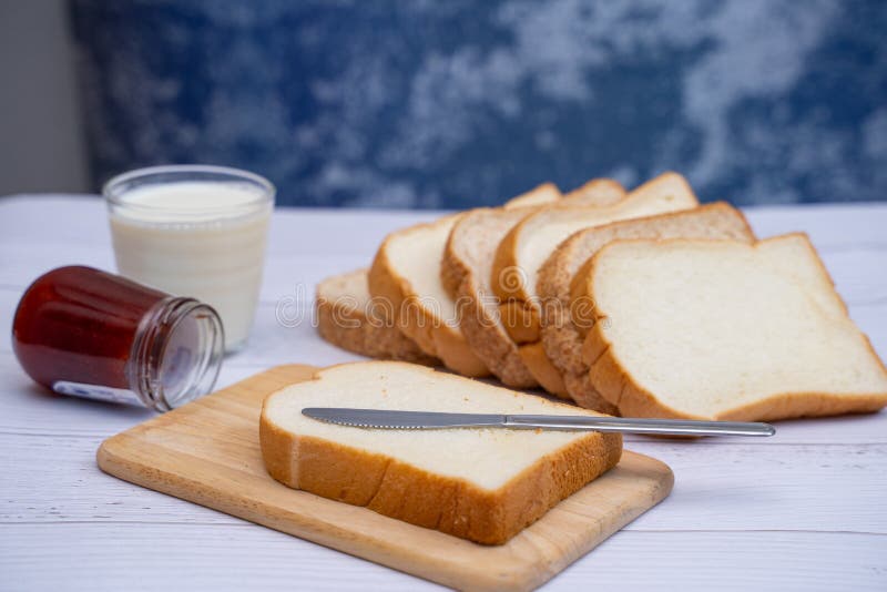 Sliced Bread with Jam and Milk for Breakfast Stock Image - Image of ...