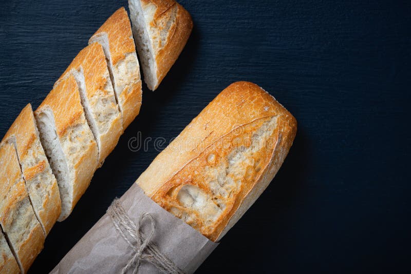 Sliced Bread Over Dark Stone Table. View from Above with Copy Space ...