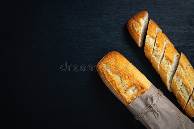 Sliced Bread Over Dark Stone Table. View from Above with Copy Space ...