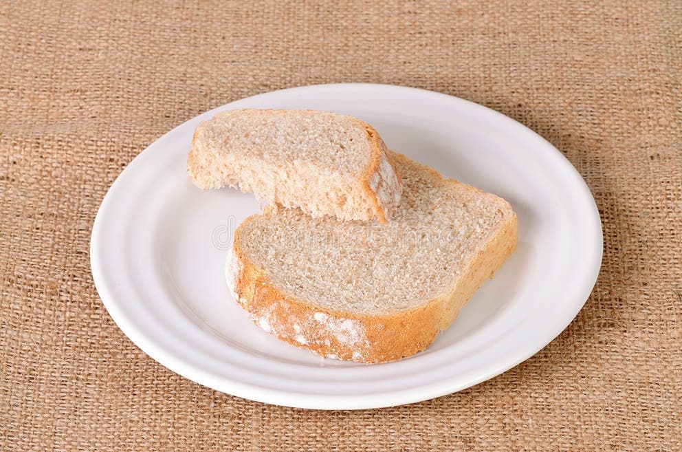 Sliced bread on plate stock photo. Image of corn, bread - 46317462
