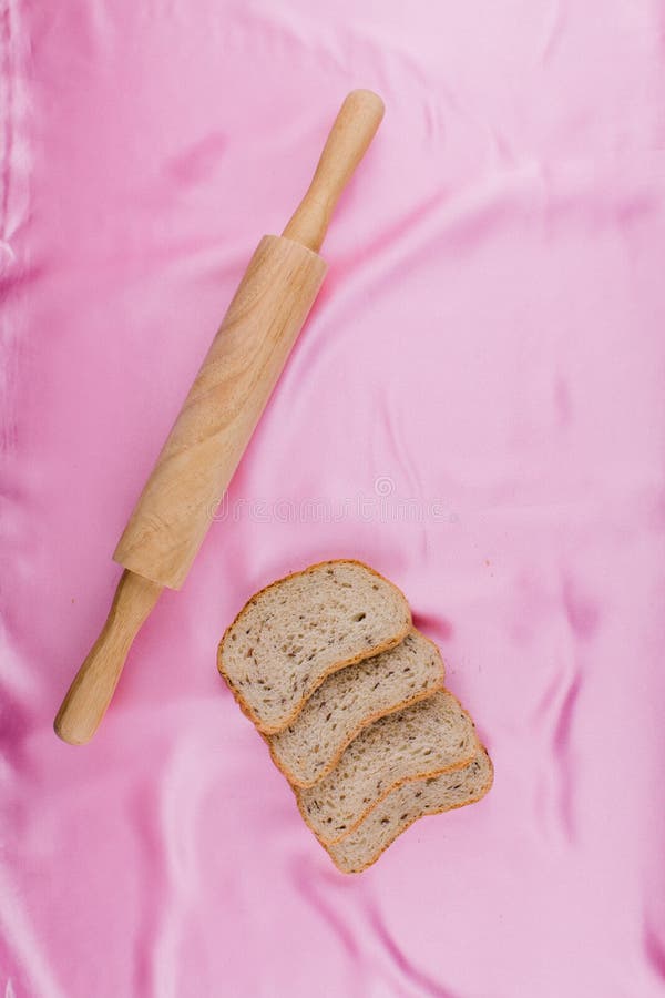 Sliced Bread with a Rolling Pin on the Cloth Stock Photo - Image of ...