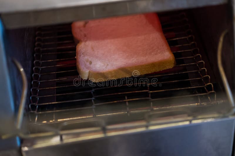 Sliced Bread in Toaster for Breakfast Stock Photo - Image of fresh ...