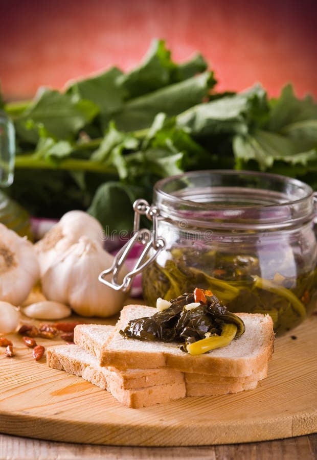 Sliced Bread with Turnip Tops Under Oil. Stock Photo - Image of closeup ...