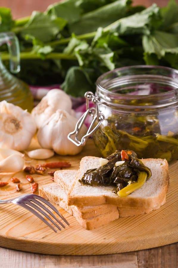 Sliced Bread with Turnip Tops Under Oil. Stock Photo - Image of ...