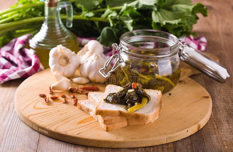 Sliced Bread with Turnip Tops Under Oil. Stock Photo - Image of bread ...