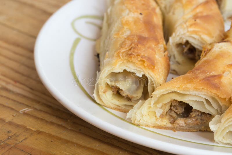 Sliced Burek with Meat on the Wooden Board. Rustic Food. Stock Photo ...