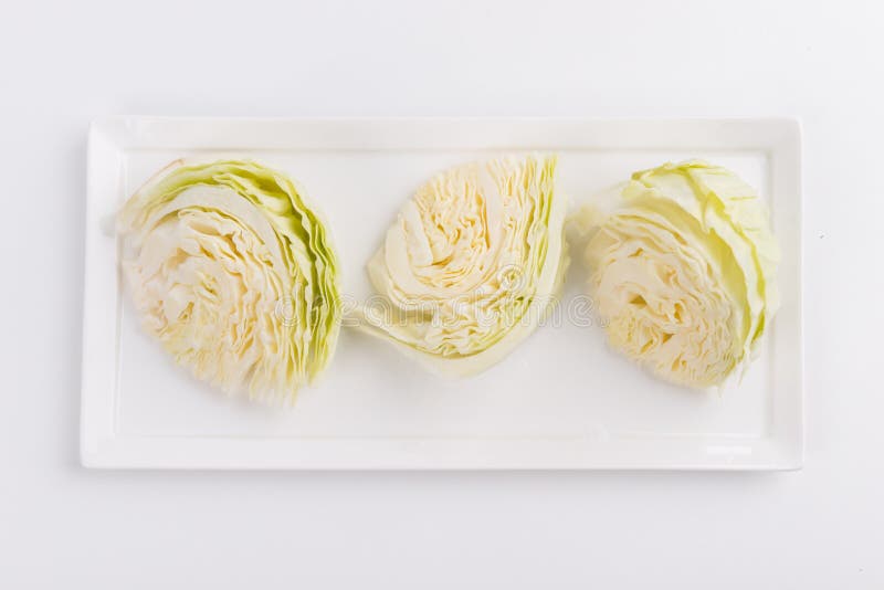 Sliced Cabbage in White Plate Stock Photo - Image of dinner, isolated ...