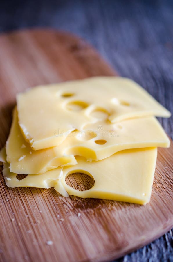 Sliced cheese stock photo. Image of cheese, cutting, piece - 33582098