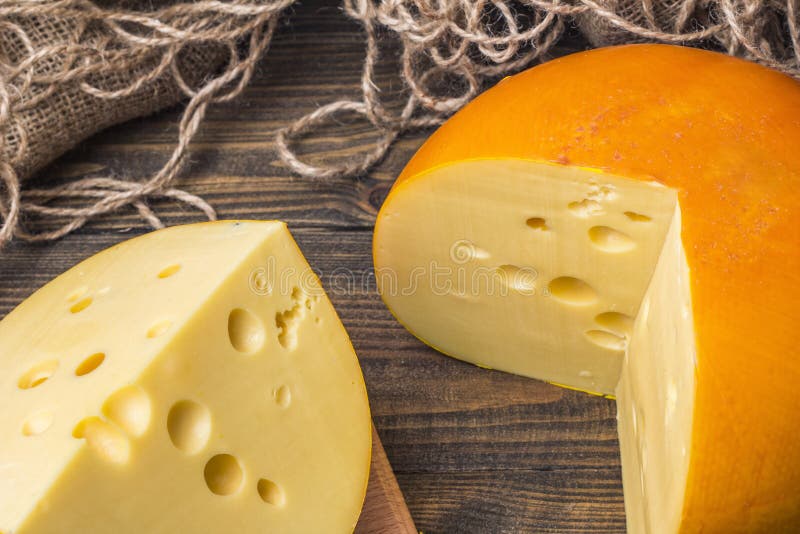 Sliced Cheese Lying on Wooden Table Top View Stock Image - Image of ...