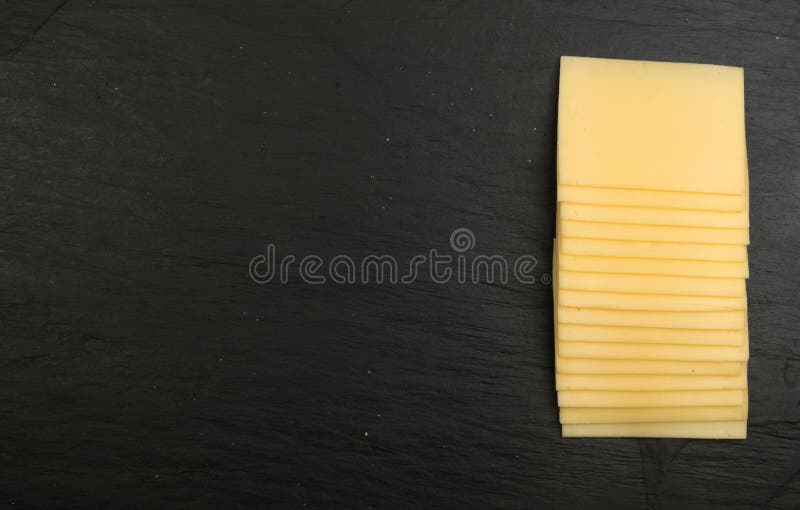 Sliced Cheese Over Stone Background Stock Image - Image of piece, lunch ...