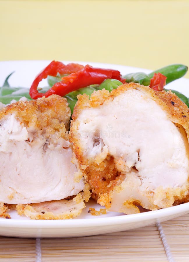 Sliced chicken breast stock image. Image of plate, black - 14924019