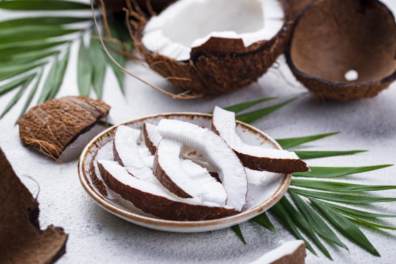 Sliced Coconut and Palm Leaves Stock Photo - Image of coco, nutrition ...