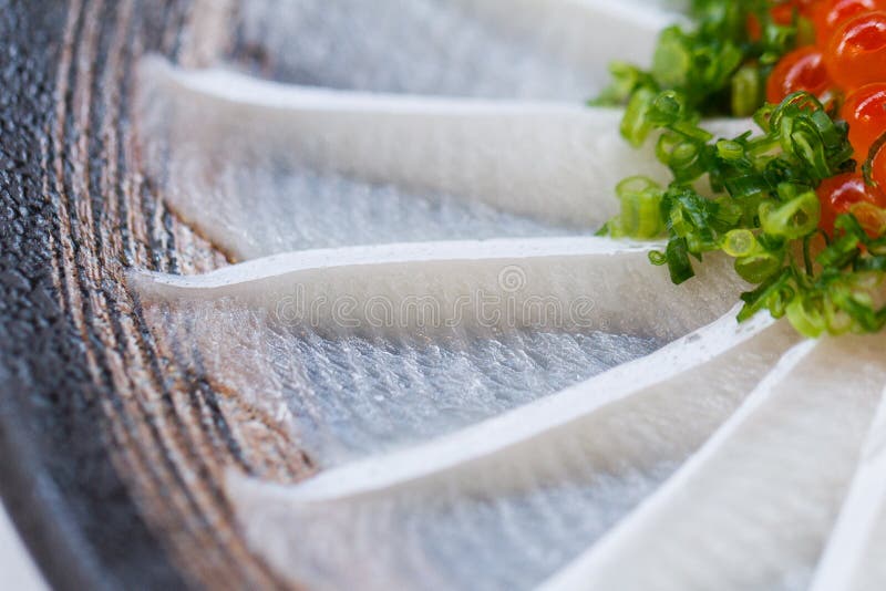 Sliced Cod Fish Sashimi Served with Ikura Salmon Roe, Scallion and ...