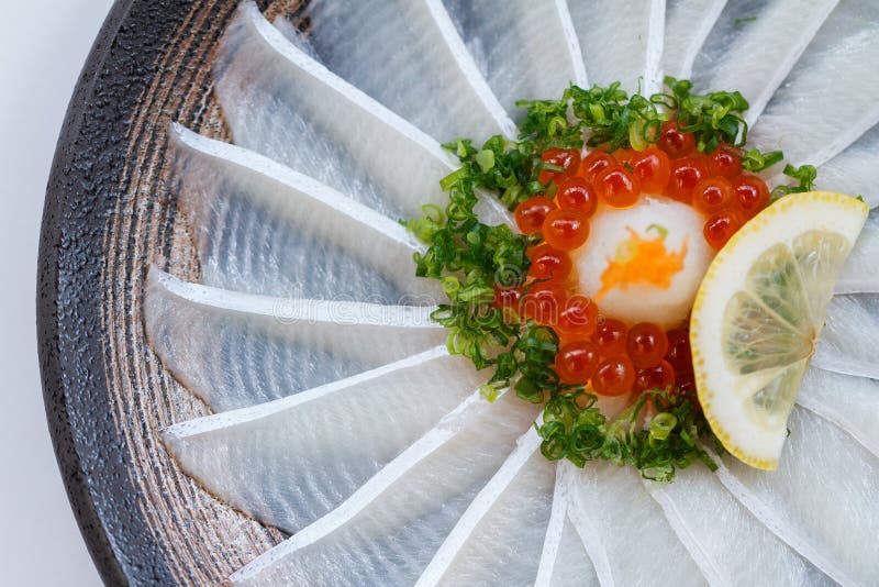 Sliced Cod Fish Sashimi Served with Ikura Salmon Roe, Scallion and ...