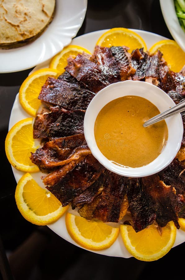 Sliced Crispy Peking Duck with Pancakes Stock Photo - Image of green ...