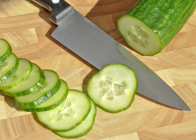 Sliced cucumber stock photo. Image of shadow, wood, refreshing - 15317836