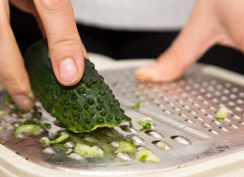 Sliced Cucumber on a Grater Stock Image - Image of peeler, machine ...
